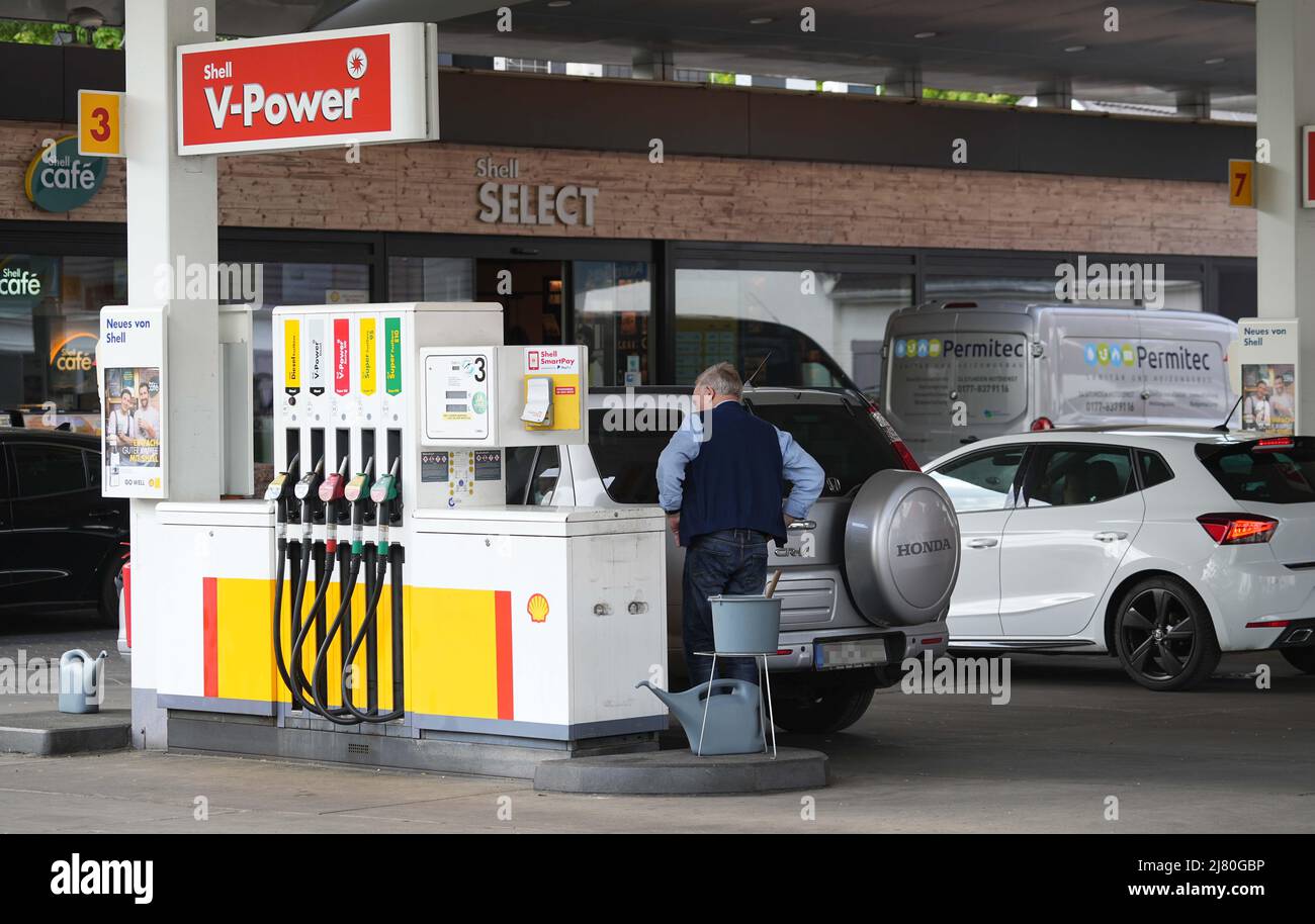 Berlin, Germany. 11th May, 2022. A man fuels a vehicle at a gas station ...