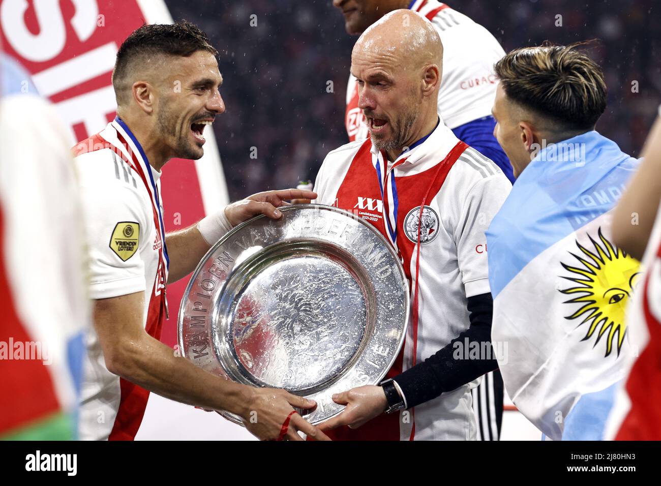 AMSTERDAM - (lr) Dusan Tadic of Ajax, Ajax coach Erik ten Hag with the championship scale ...