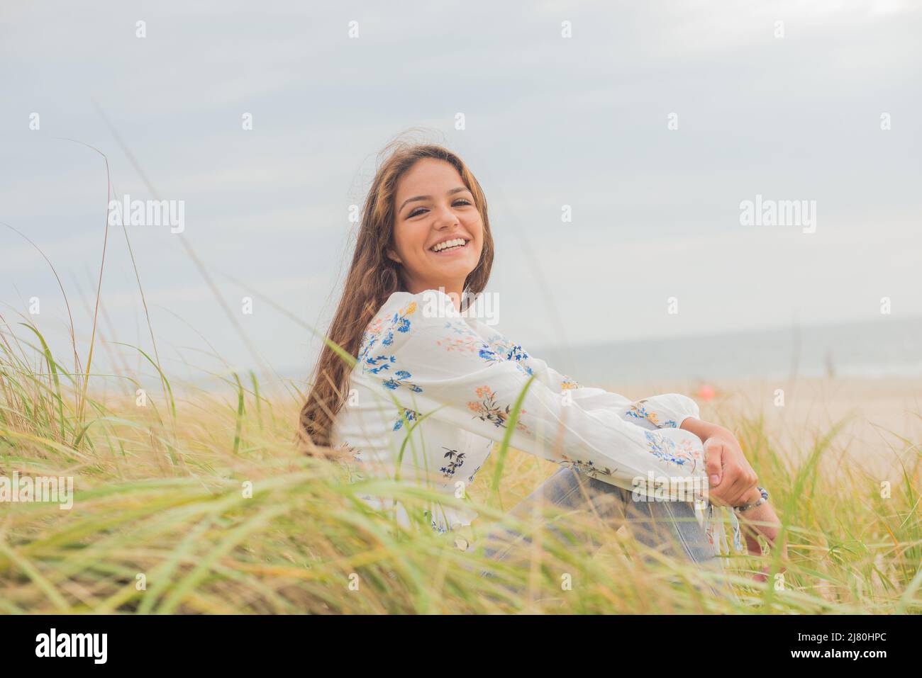 Feeling alive and beautiful on the beach Stock Photo - Alamy