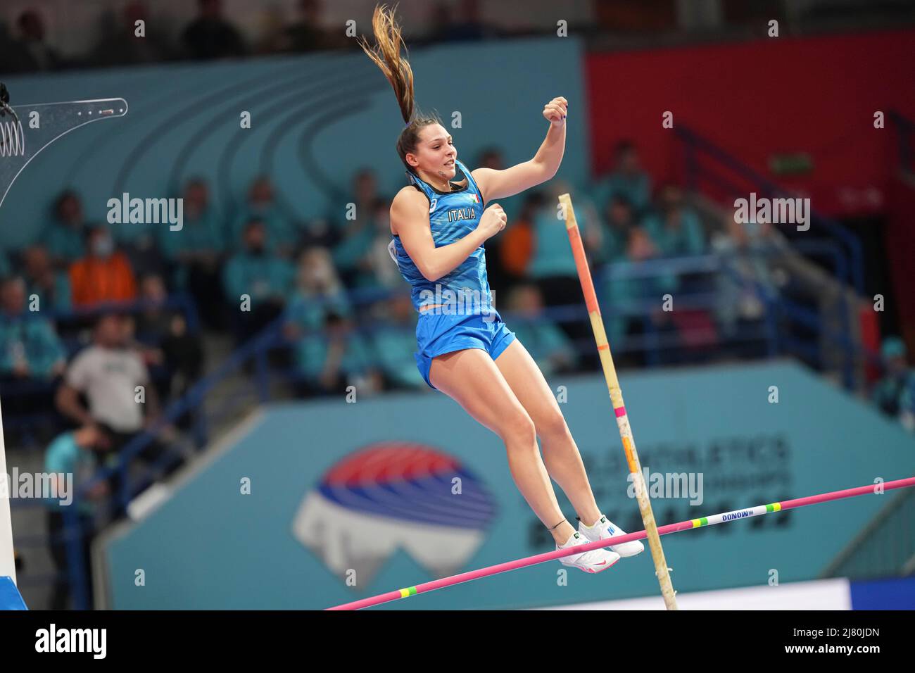 Elisa Molinaro jumping at the 2022 Belgrade Indoor World Championships ...