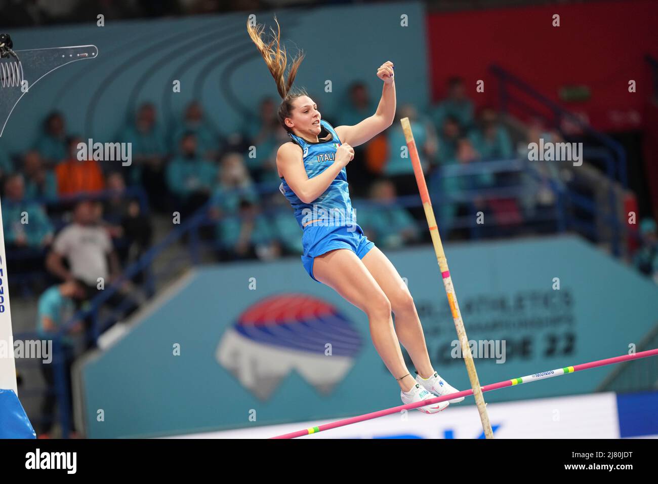 Elisa Molinaro jumping at the 2022 Belgrade Indoor World Championships ...