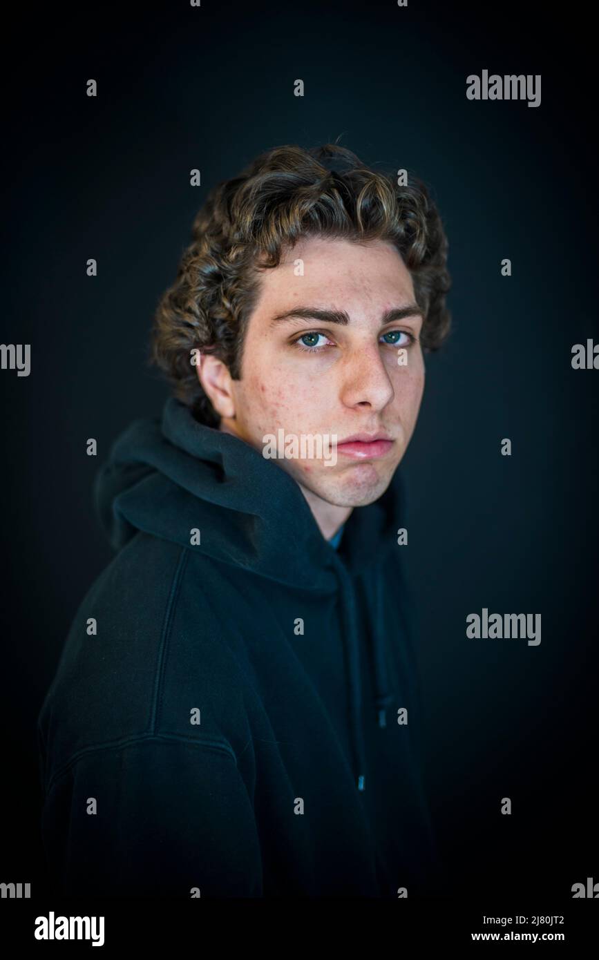 Portrait of an angry teen Stock Photo - Alamy