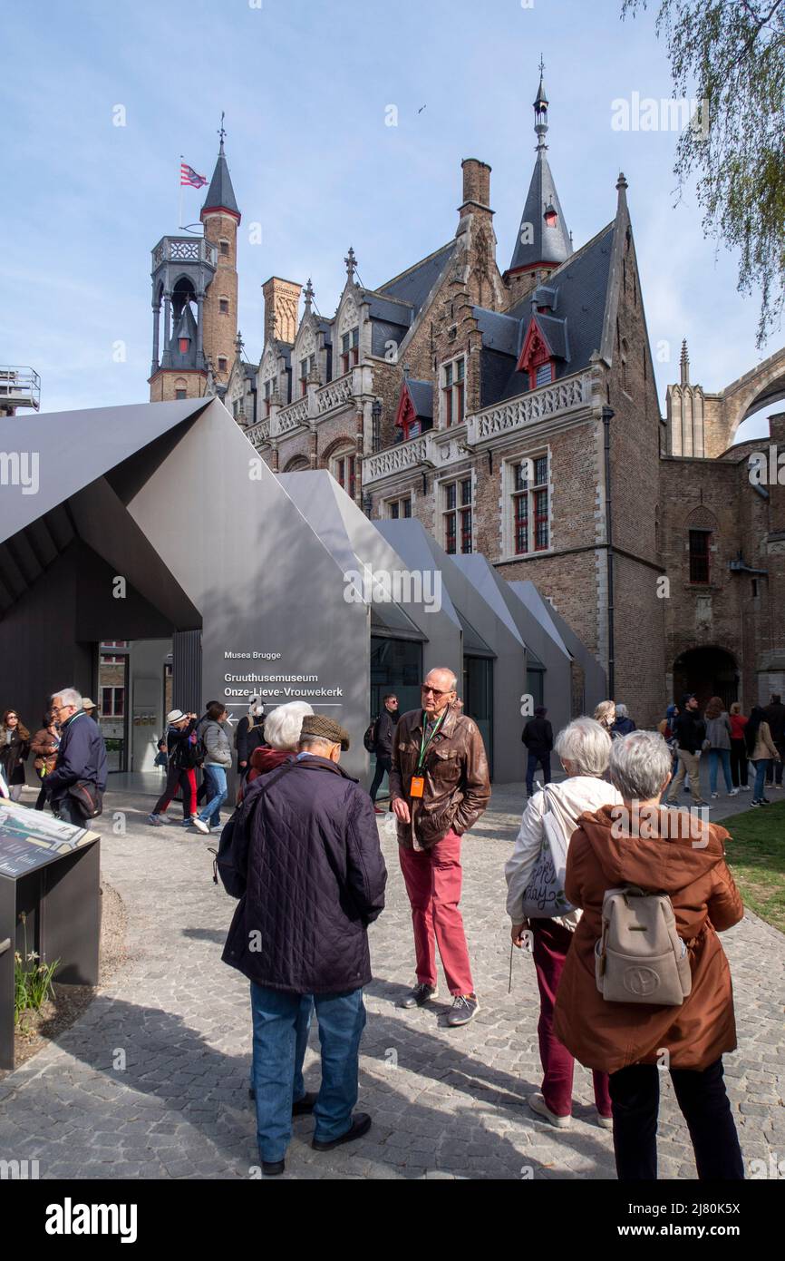 Tourists gather outside the historic Gruuthuse Museum in Bruges ...