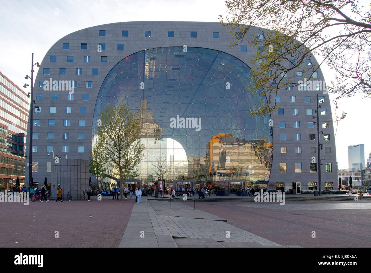 Modern arch-shaped Markthal market hall building with glass facade and ...
