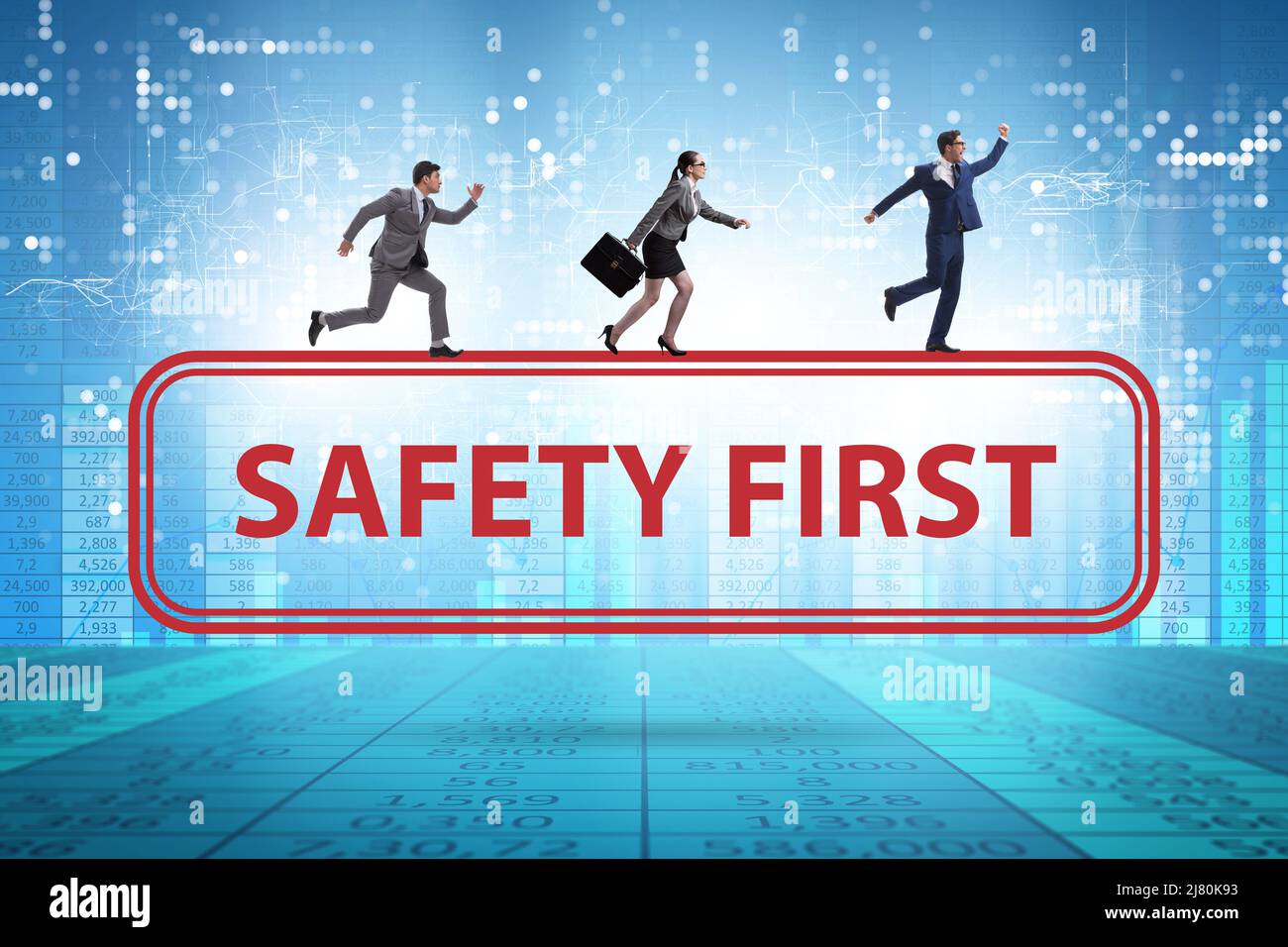 Safety first badge with the business people Stock Photo - Alamy