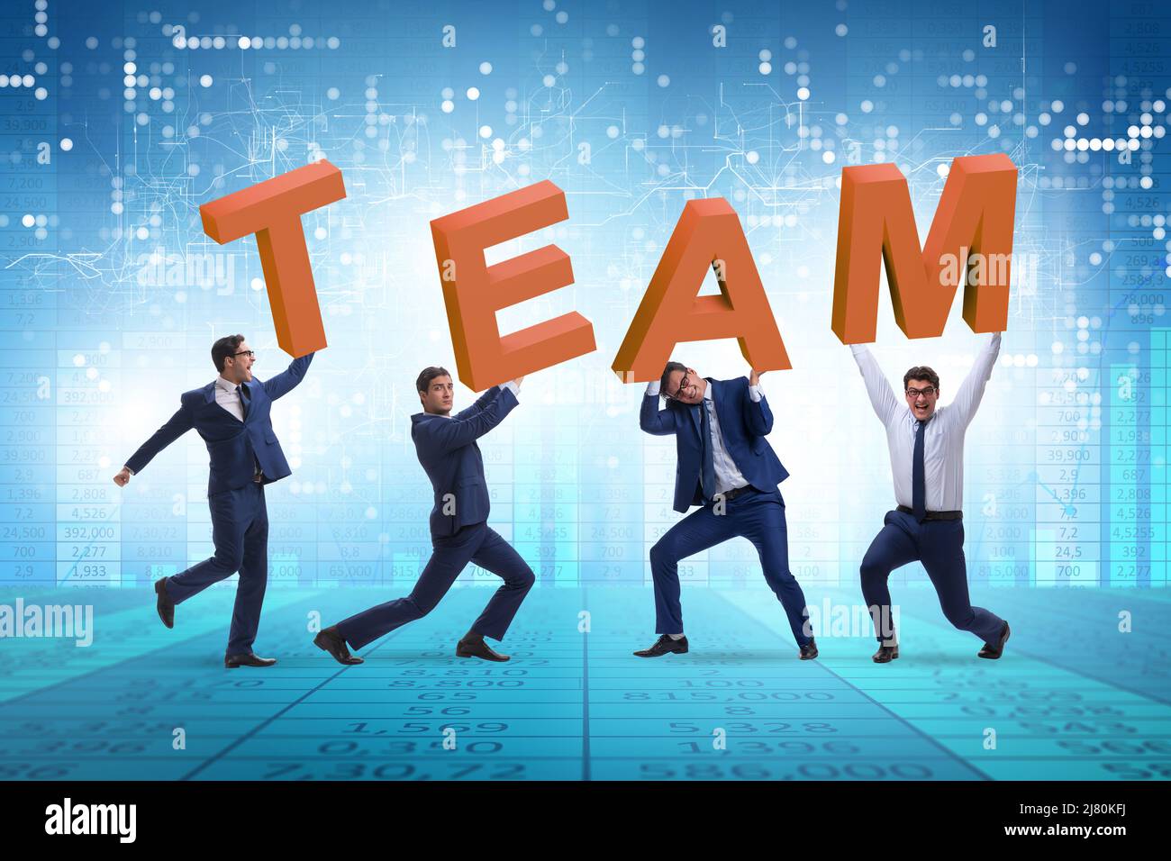 Teamwork concept with the people carrying team letters Stock Photo - Alamy