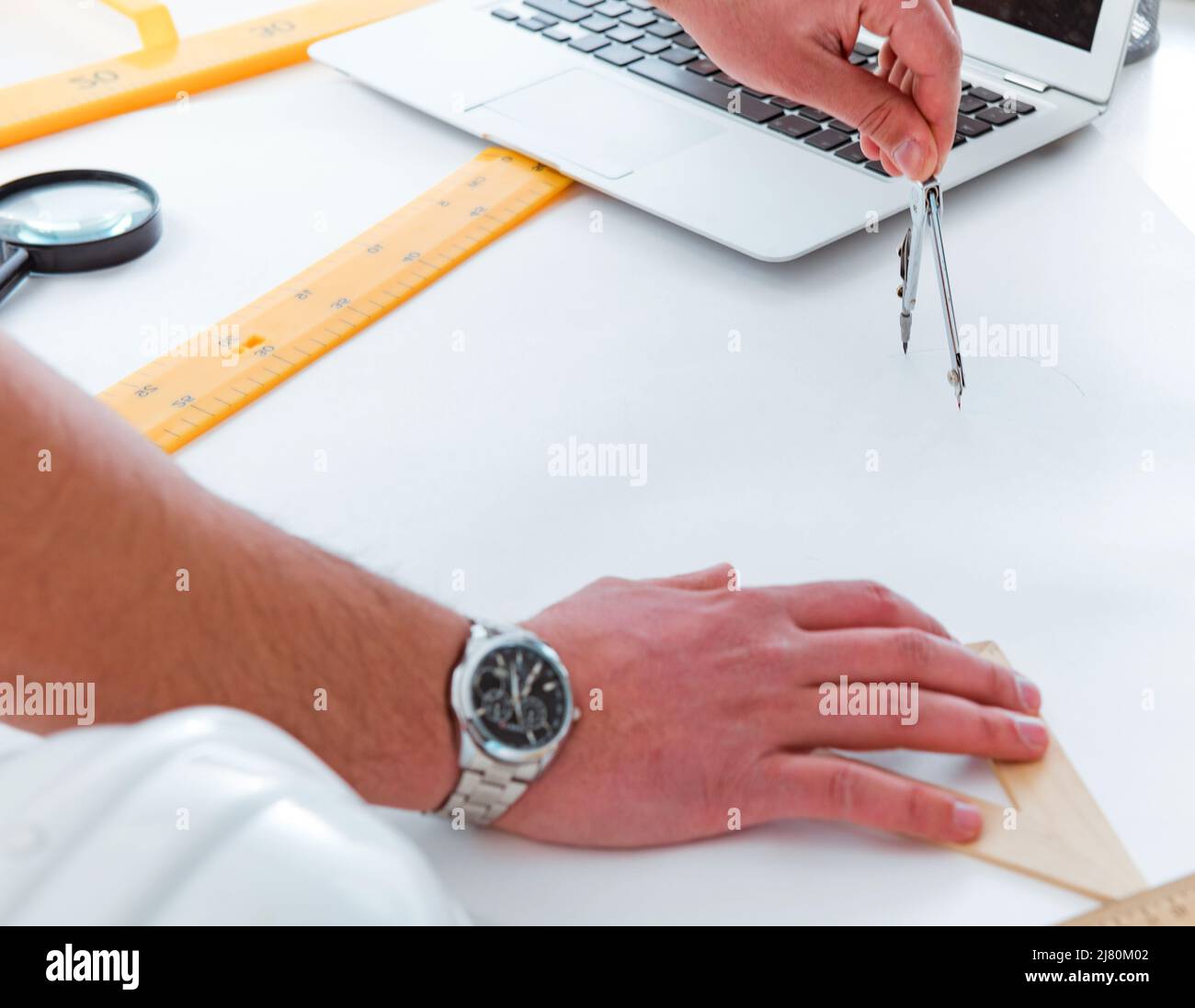 The male engineer working on drawings and blueprints Stock Photo - Alamy