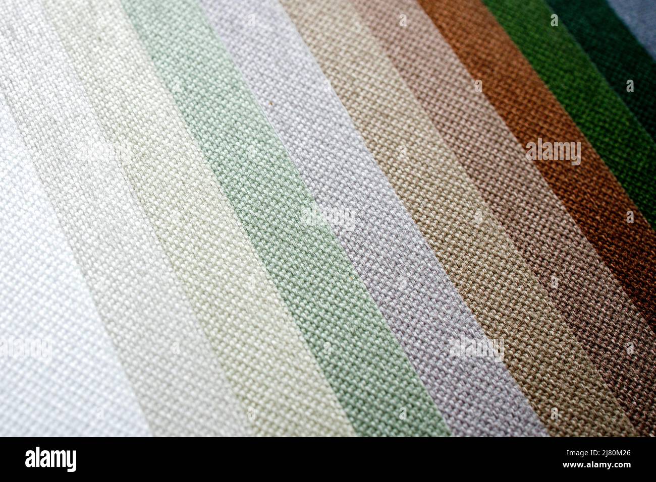 Multicolored fabric background. Variety of color of dense fabric. Color ...