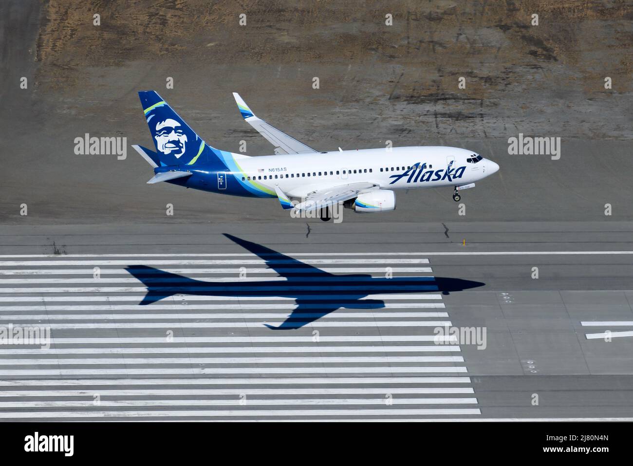 Alaska Airlines Boeing 737 airplane landing at runway in Alaska ...