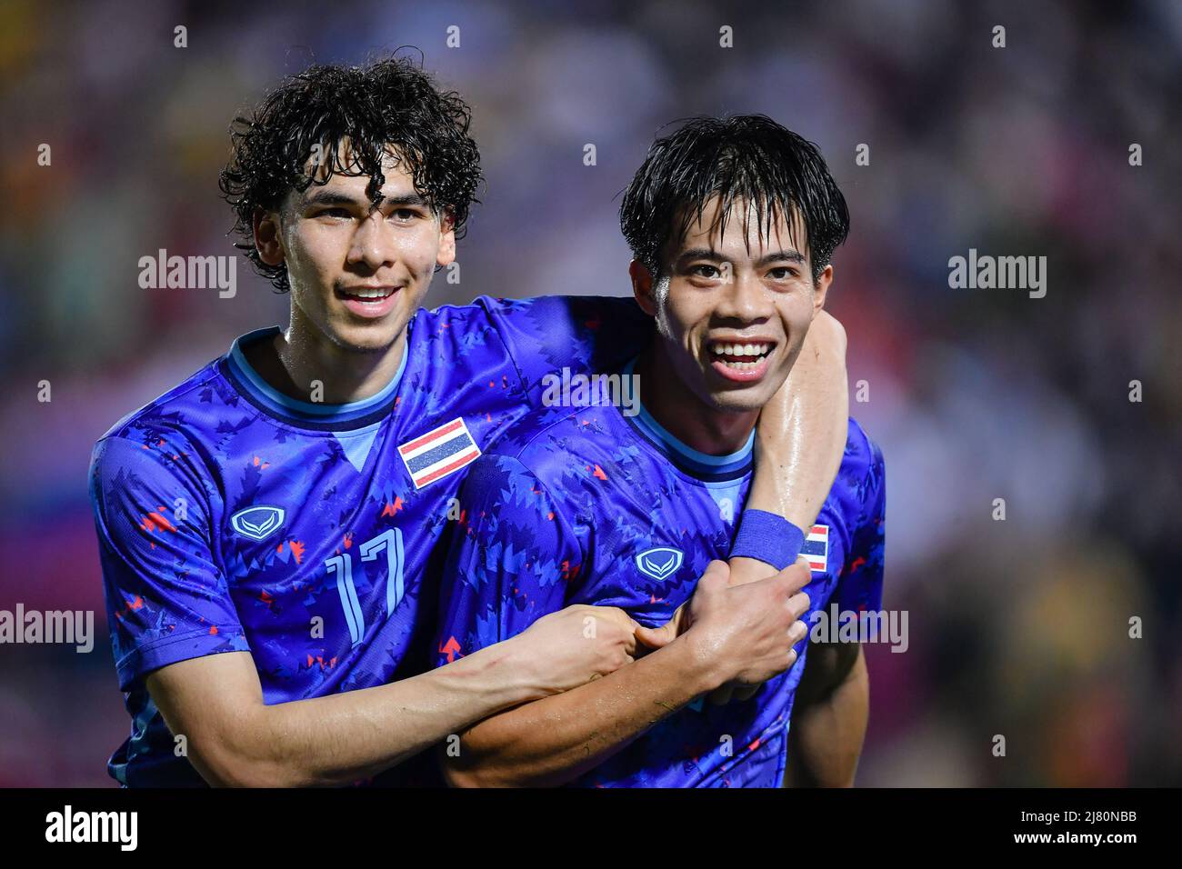 Benjamin Jame Davis (L) and Ekanit Panya of Thailand celebrate a goal ...