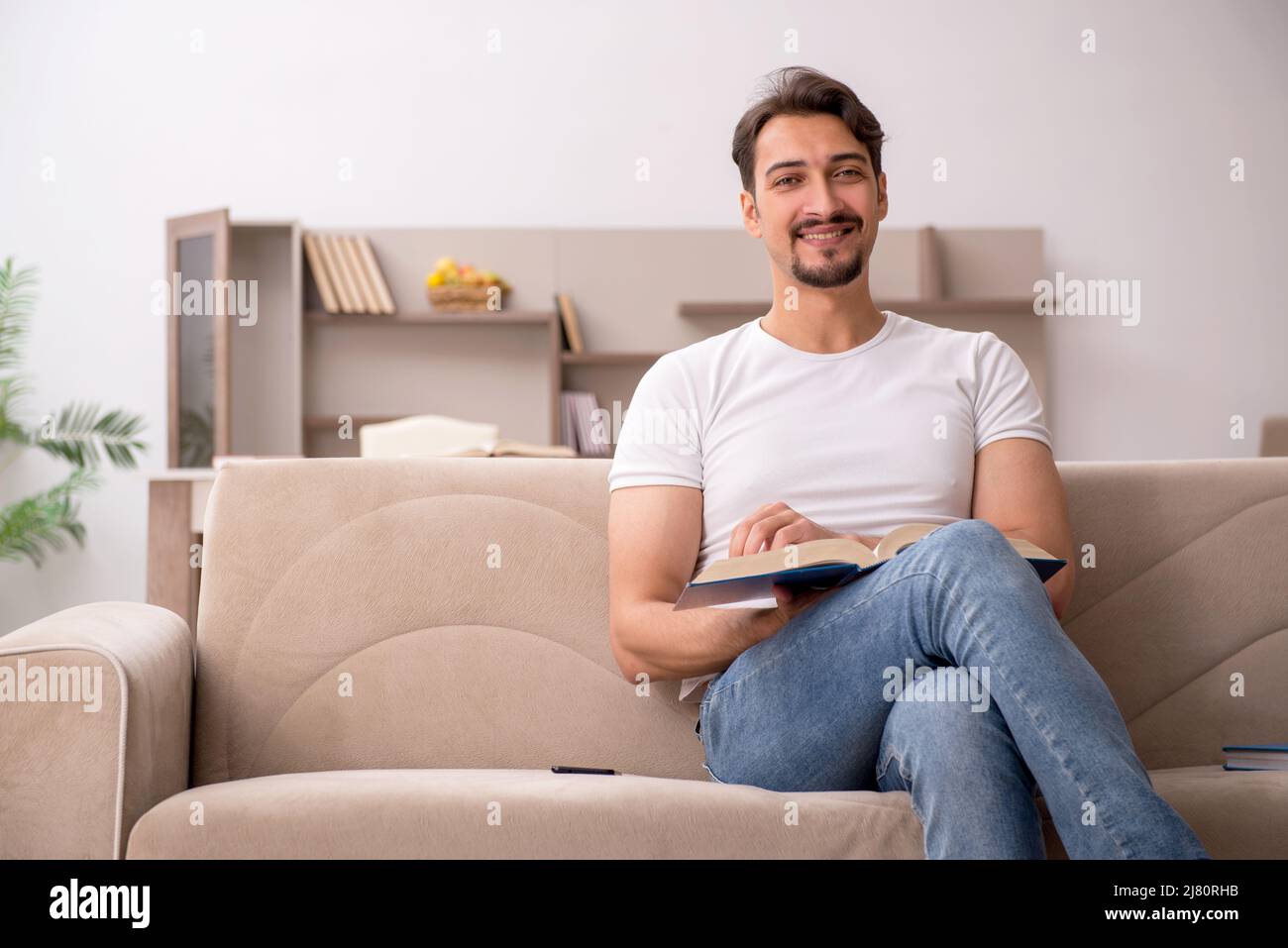 Young student studying at home during pandemic Stock Photo - Alamy