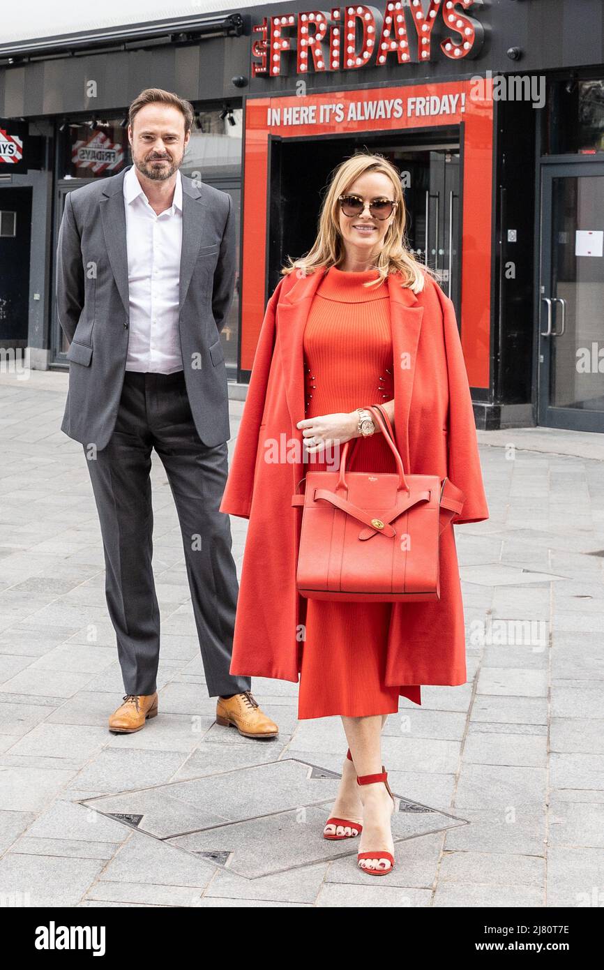 Amanda Holden and Jamie Theakston pose outside Heart studios as they ...