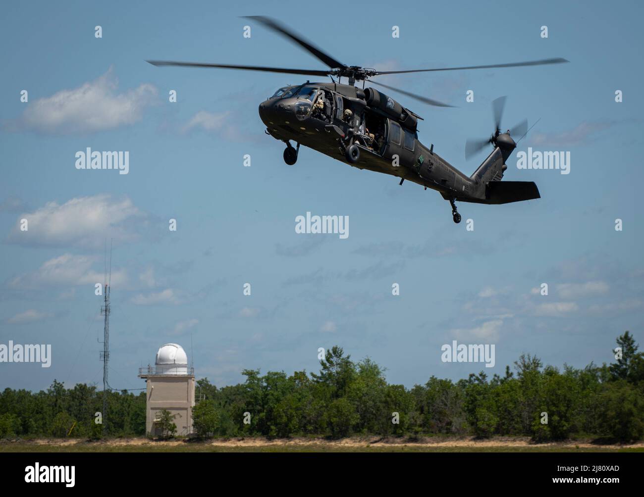 An Army UH-60 Blackhawk helicopter brings in Rangers for a ...