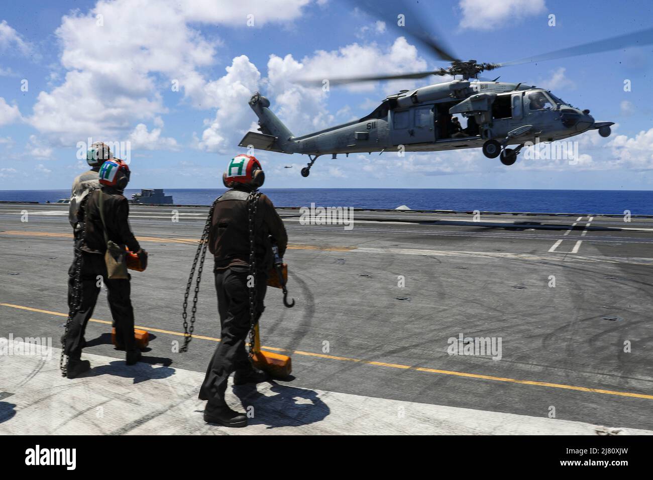 PHILIPPINE SEA (May 10, 2022) Airman Recruit Shaylia Labay, right, from ...