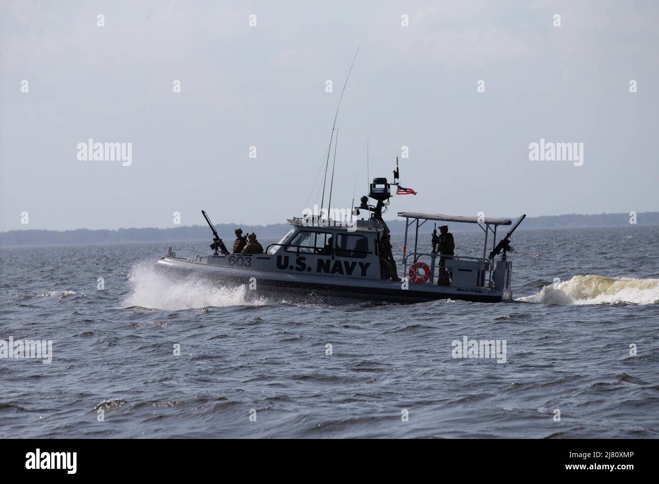 A U.S. Navy patrol boat with Maritime Expeditionary Security Squadron 4 ...