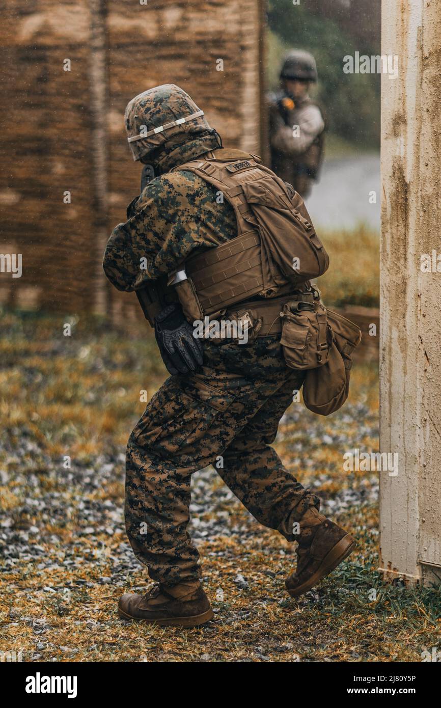 A U.S. Marine with Marine Air Support Squadron (MASS) 2 takes simulated ...