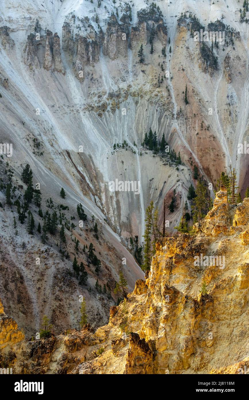 The Sun Highlights The Near Ridge With A Wall Of White Cliffs In The ...