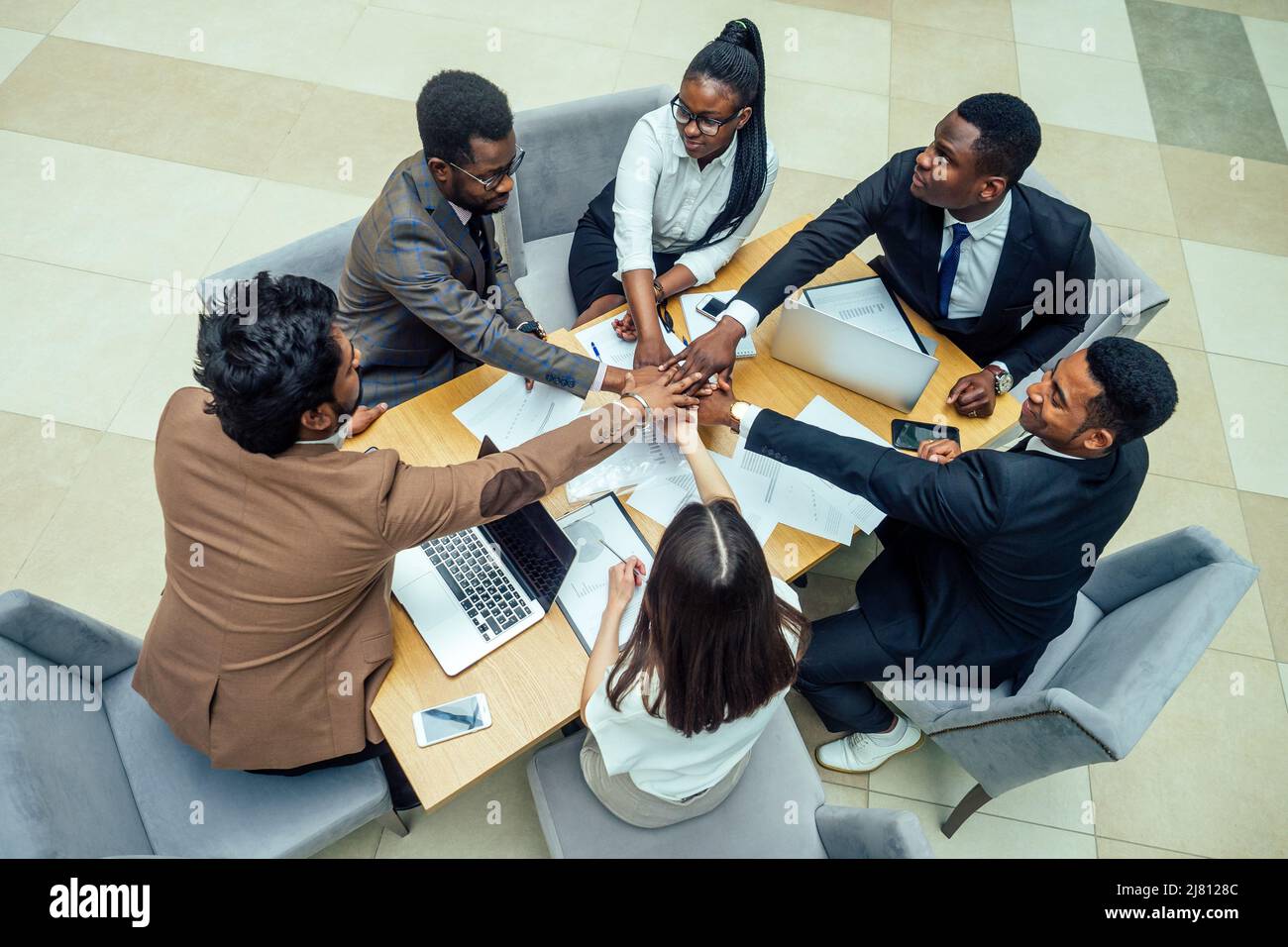 team work group of international business partners : indian,korean ...