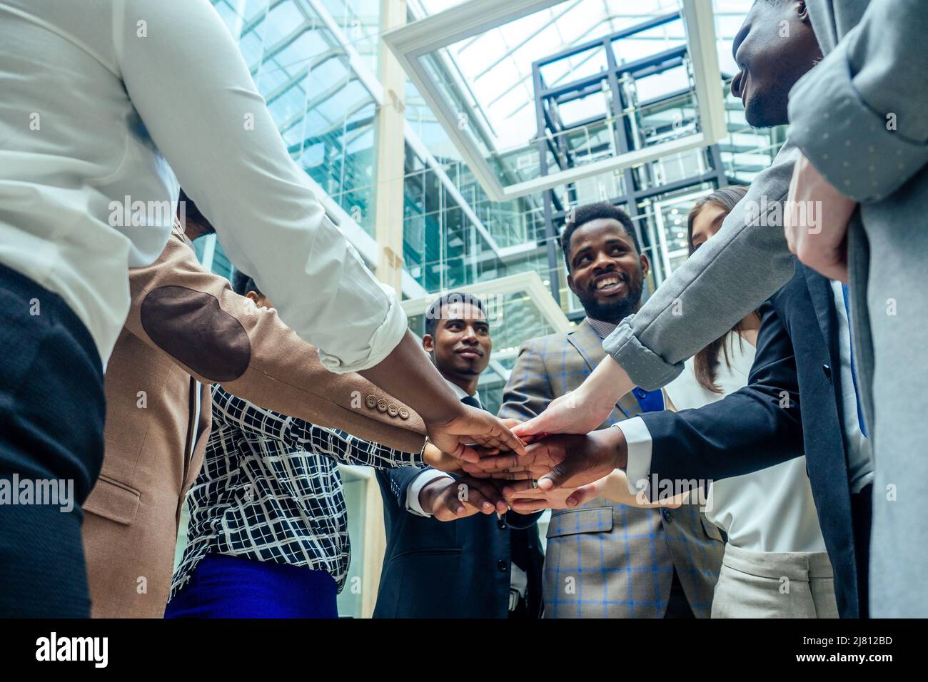 team work group of international business partners : indian,korean ...