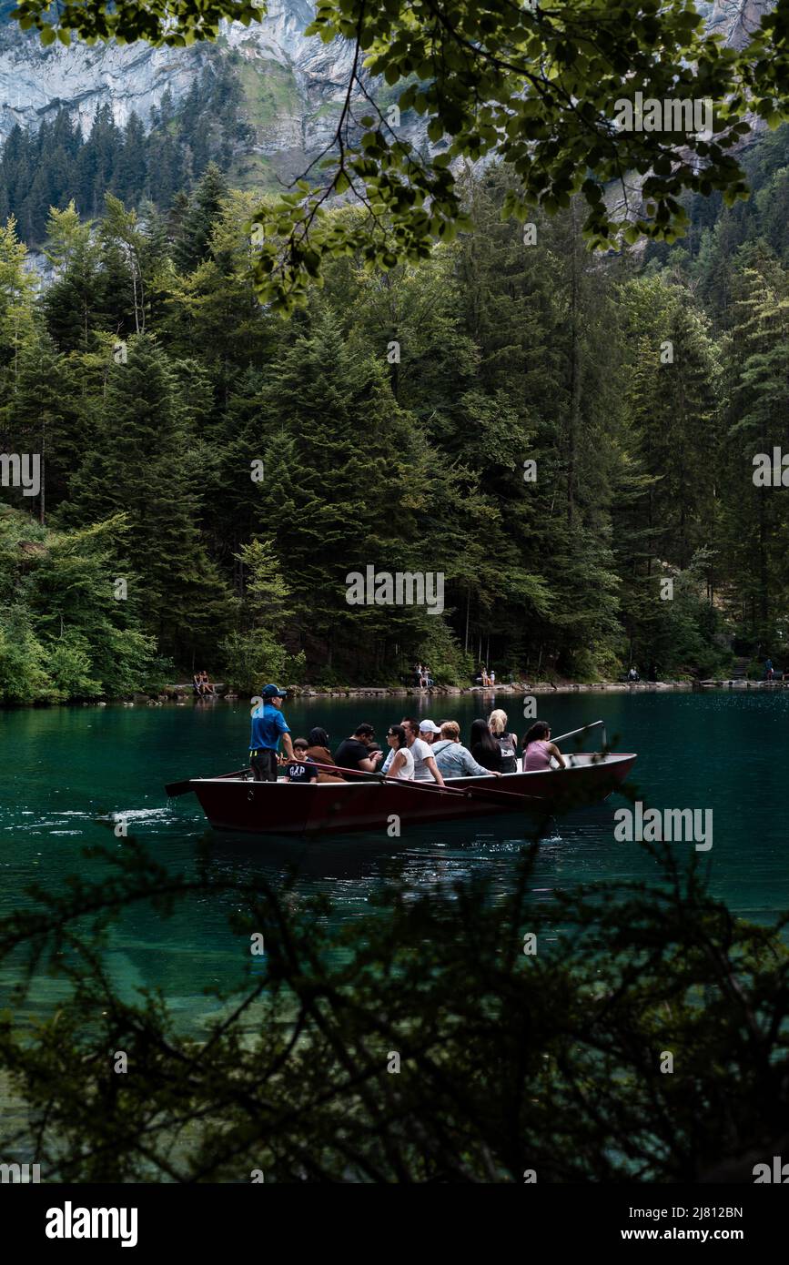 Blausee Switzerland. 16. July 2018 A romantic forest lake in Kander ...