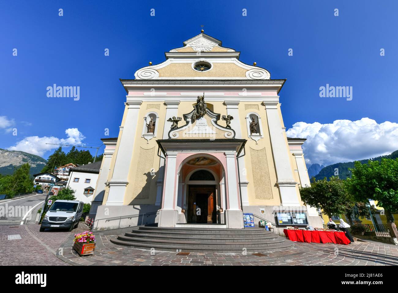 Yellow and orange Neoclassical style facade of Catholic Parish Church ...