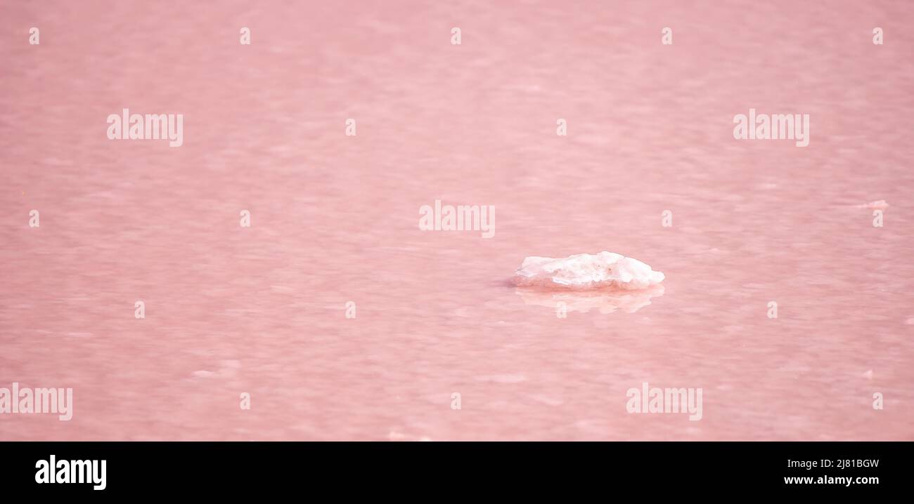 Pink salt crystals. Natural pink salt lake texture. Salt mining ...