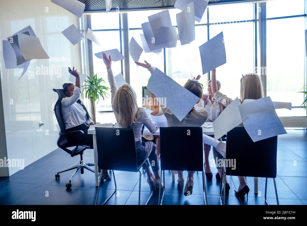 multiracial group of young women editor of famous magazine ...