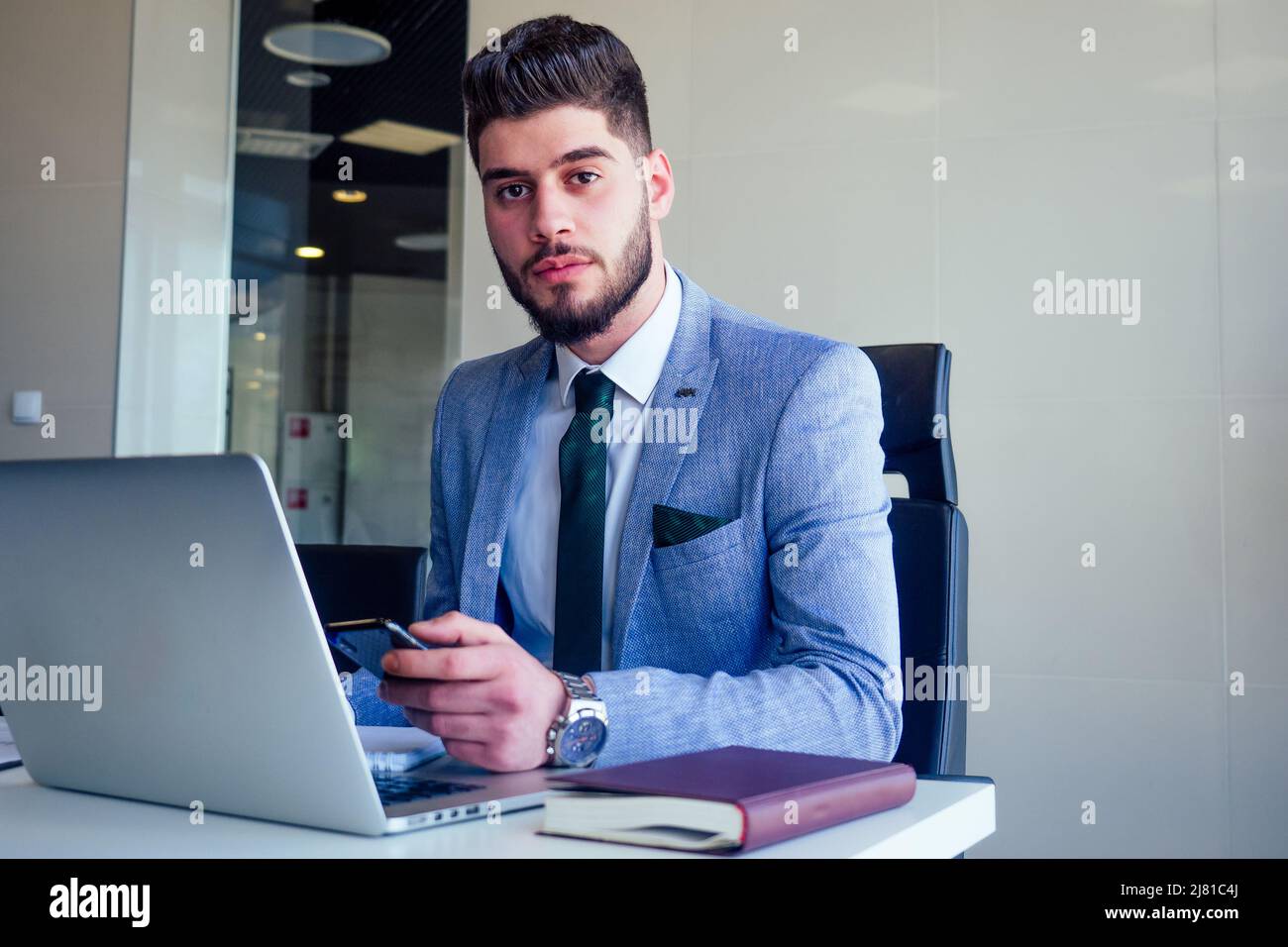 Arabic businessman in Dubai airport glass windows Stock Photo - Alamy