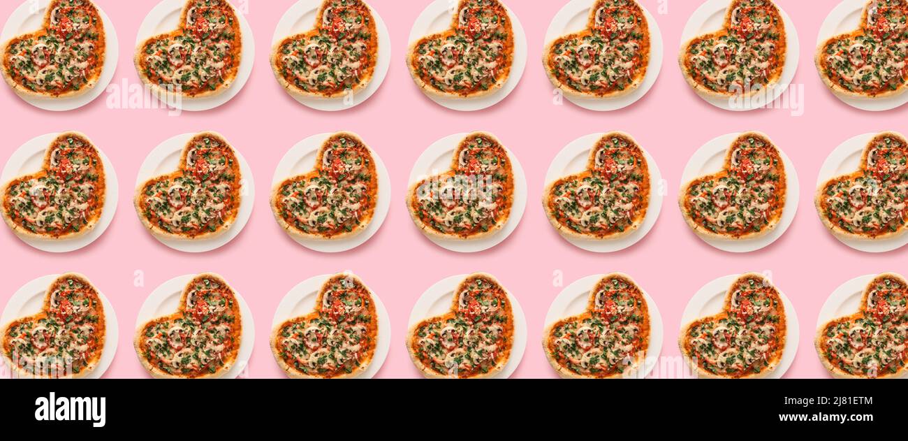Many heart-shaped pizzas on pink background. Pattern for design Stock ...