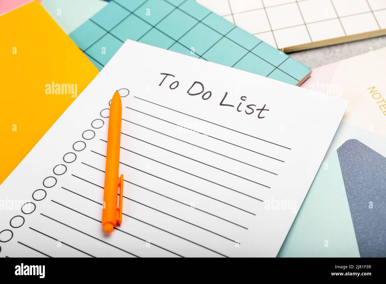 Blank to do list, pen and notebooks, closeup Stock Photo - Alamy