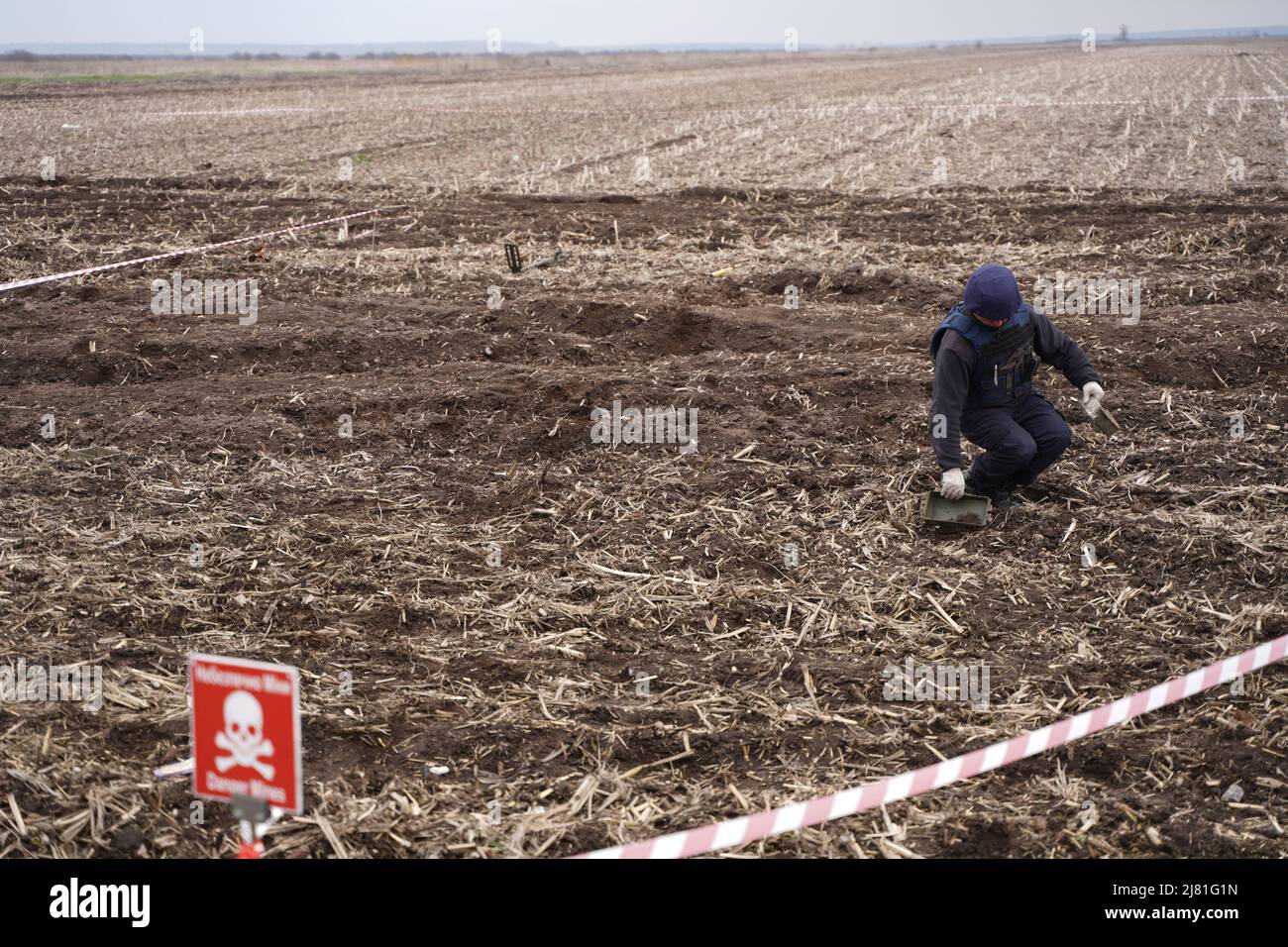 Demining by troops of the territory. Many mines, shells, artillery ...