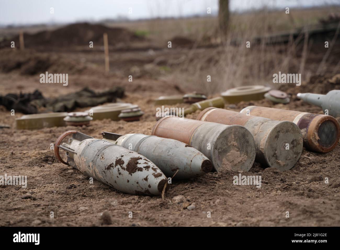 Demining by troops of the territory. Many mines, shells, artillery ...