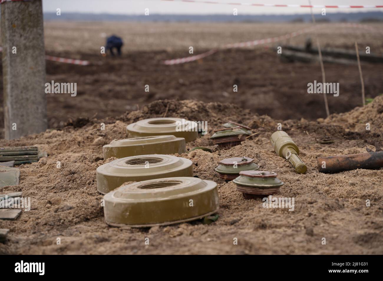 Demining by troops of the territory. Many mines, shells, artillery ...