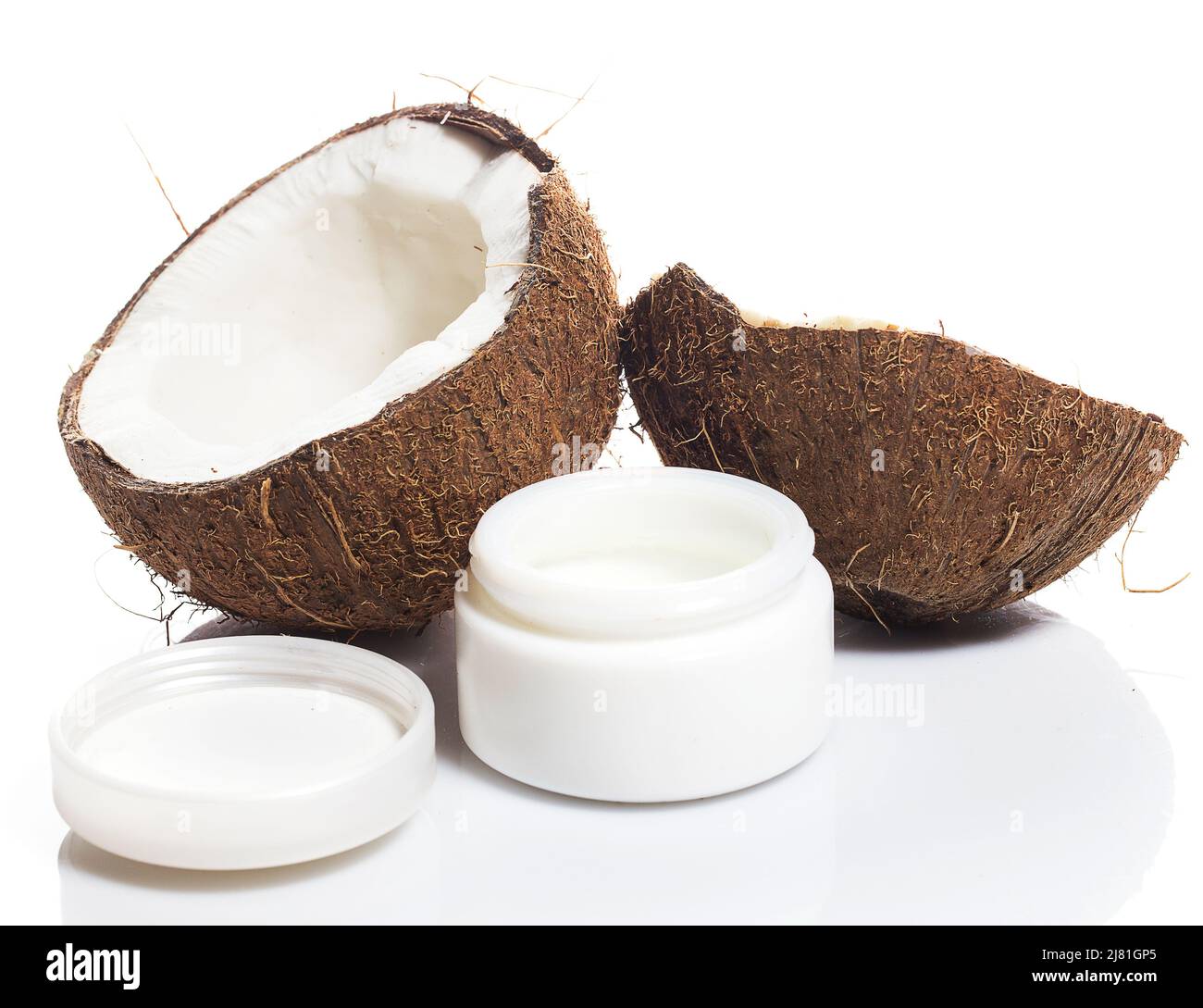 Coconut and moisturizer cream on white background Stock Photo - Alamy