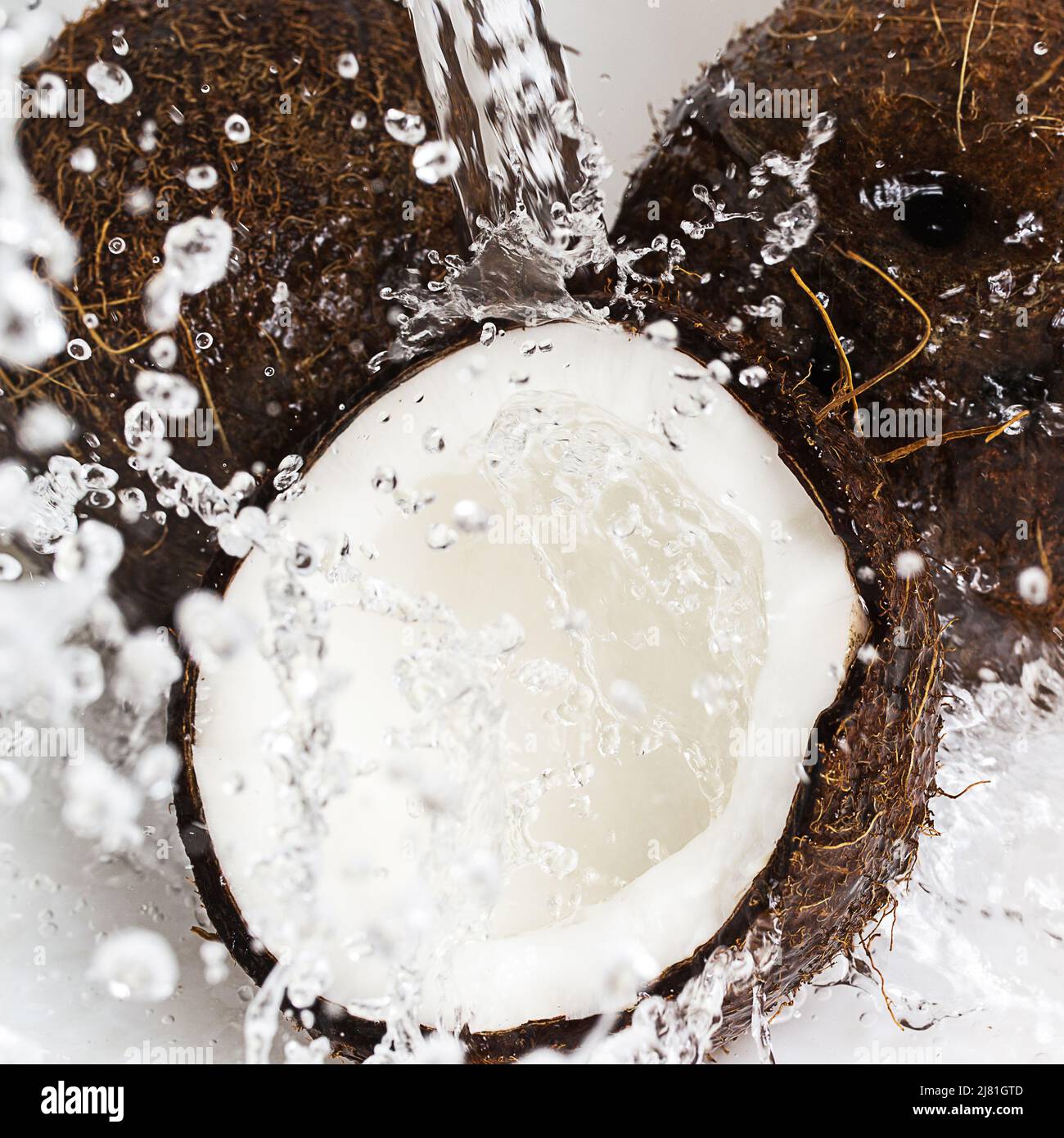 Wet fresh coconuts water hi-res stock photography and images - Alamy