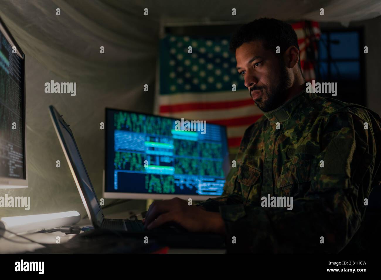 American hacker in military unifrorm on dark web, cyberwar concept ...