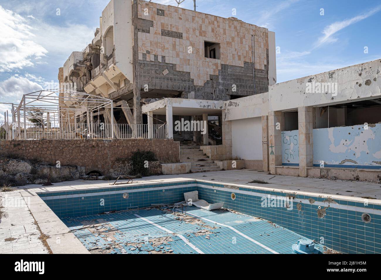 A view shows the destroyed Safir hotel, Maaloula, Syria Stock Photo - Alamy