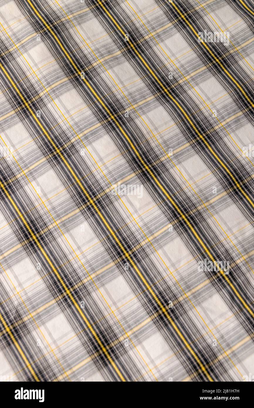 Classic geometric tweed shirt fabric in gray and yellow Stock Photo - Alamy
