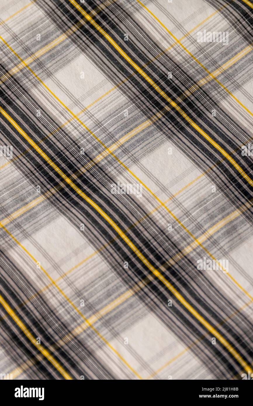 Classic geometric tweed shirt fabric in gray and yellow Stock Photo - Alamy