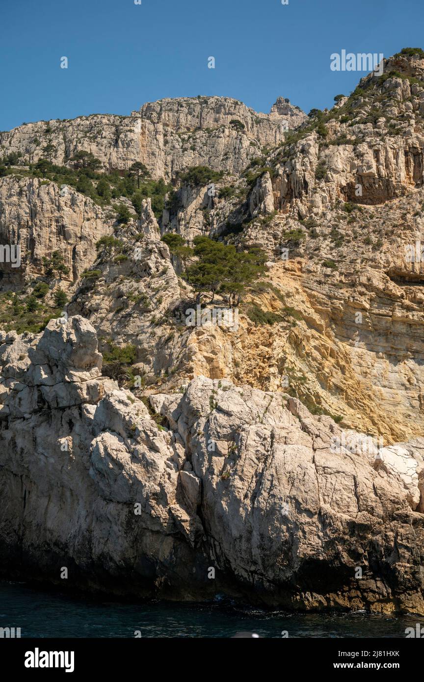 Limestone cliffs and blue sea near Cassis, boat excursion to Calanques ...