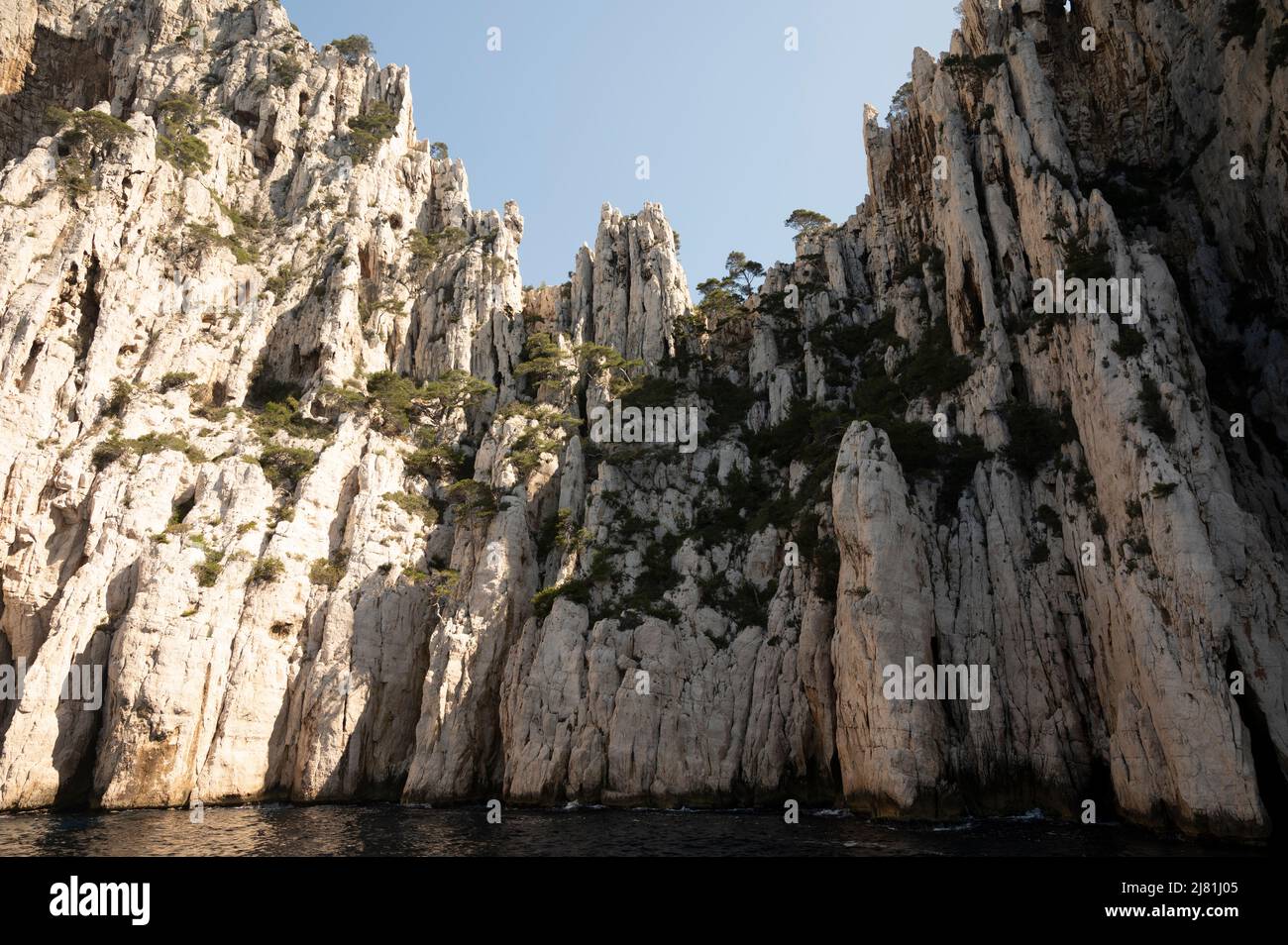 Limestone cliffs and blue sea near Cassis, boat excursion to Calanques ...