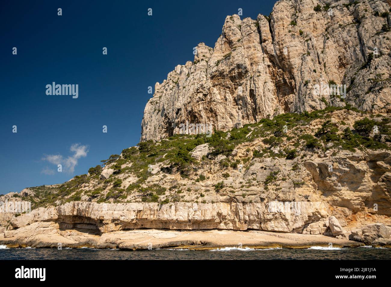 Limestone cliffs and blue sea near Cassis, boat excursion to Calanques ...