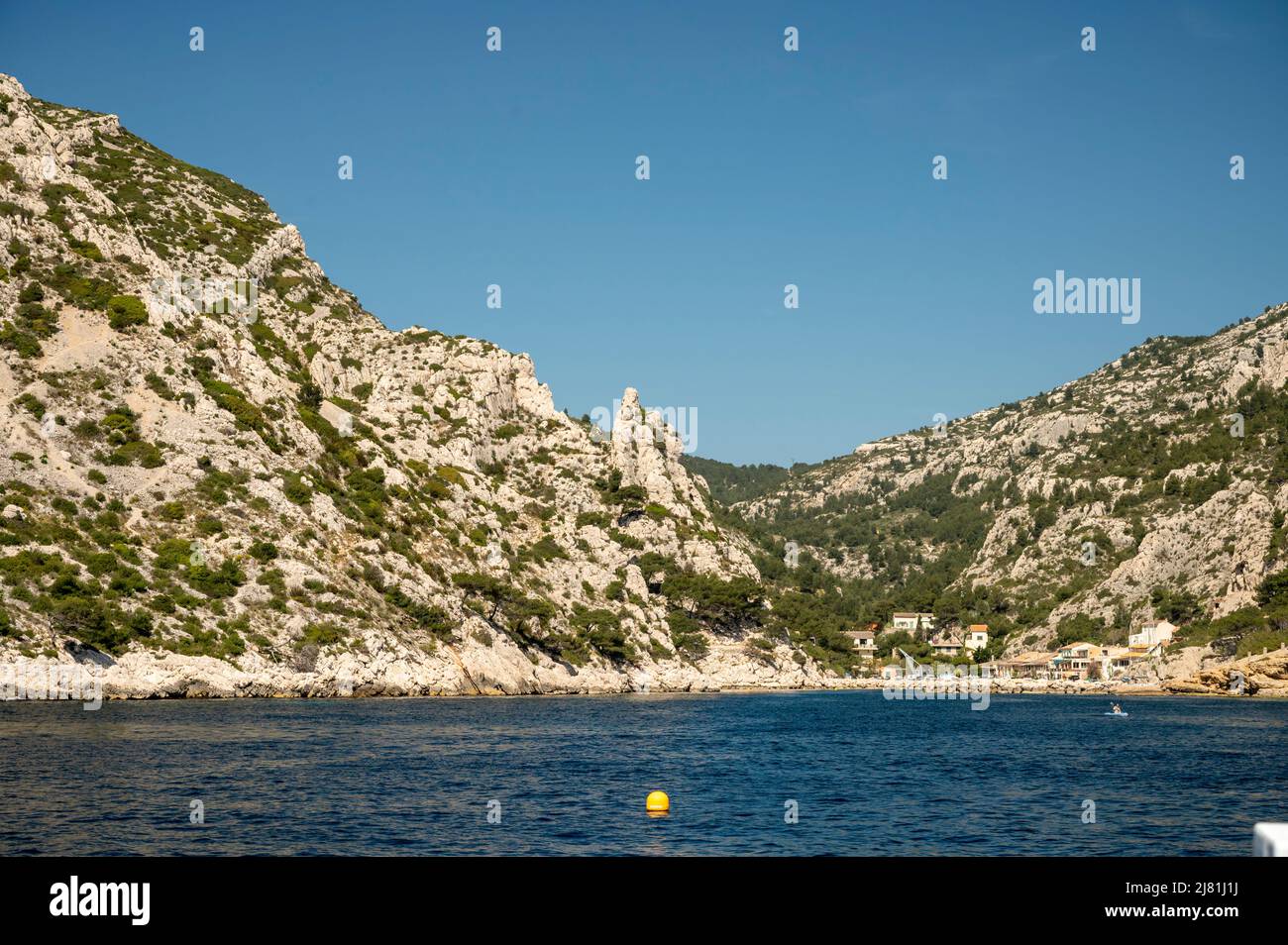 Limestone cliffs and blue sea near Cassis, boat excursion to Calanques ...
