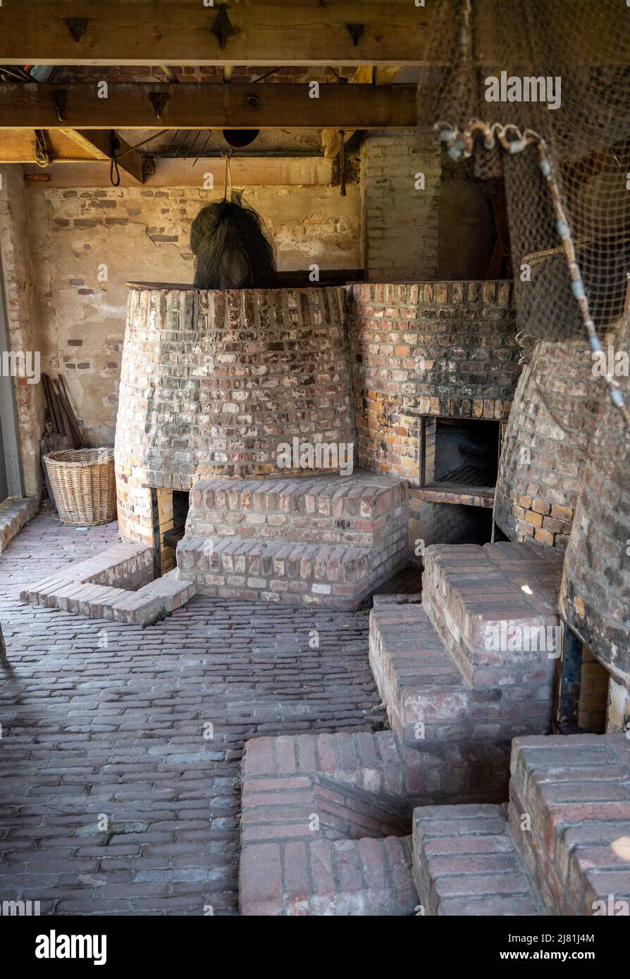 Life is old fisherman's village, tanning house with tanks for treatment ...