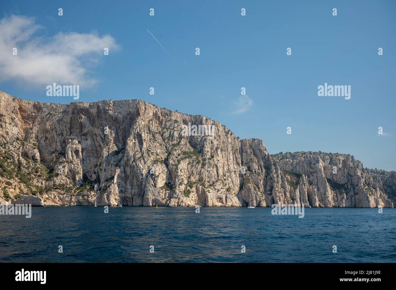 Limestone cliffs and blue sea near Cassis, boat excursion to Calanques ...