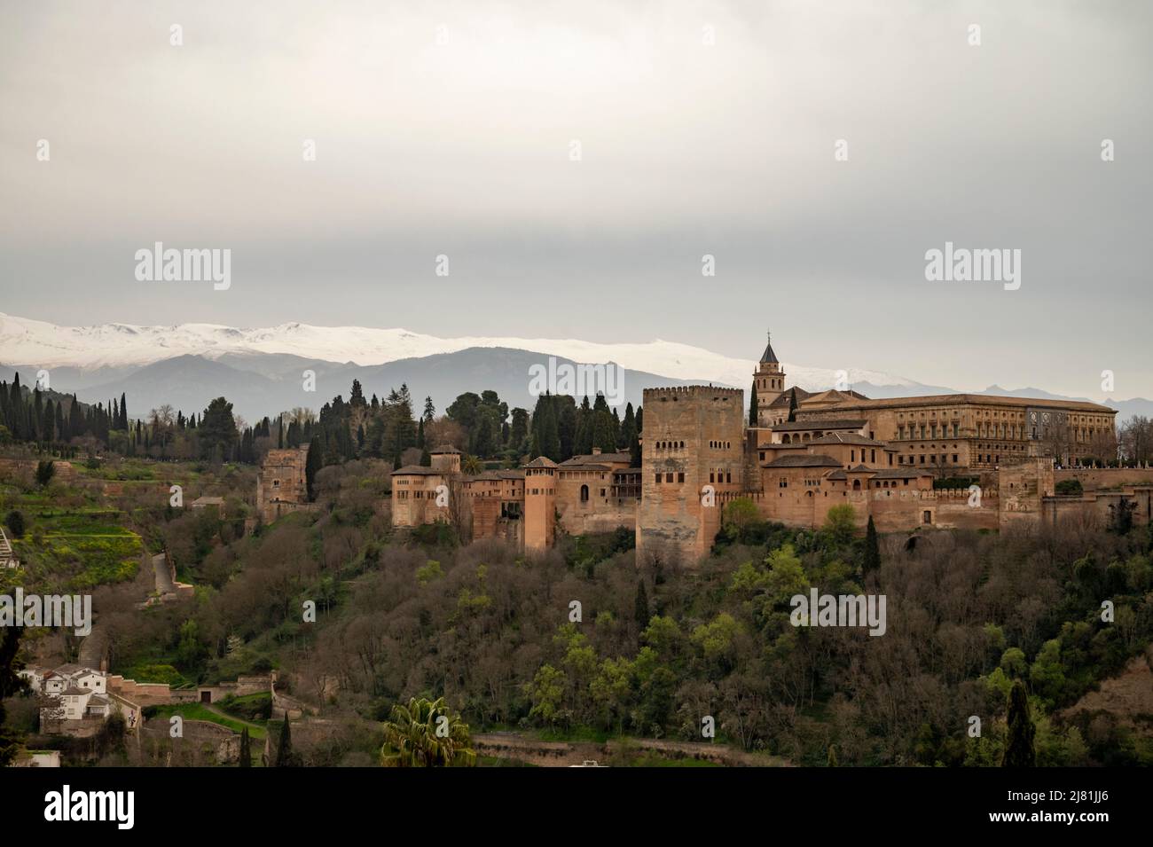 View on medieval fortress Alhambra and snow on Sierra Nevada mountains ...