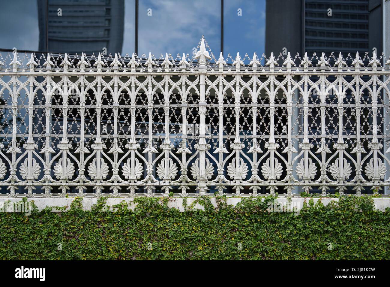 White cast-iron fence with patterns, fragment close up, outdoors Stock ...