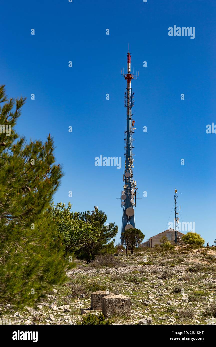 Radio and television transmitter tower above Dubrovnik Stock Photo - Alamy