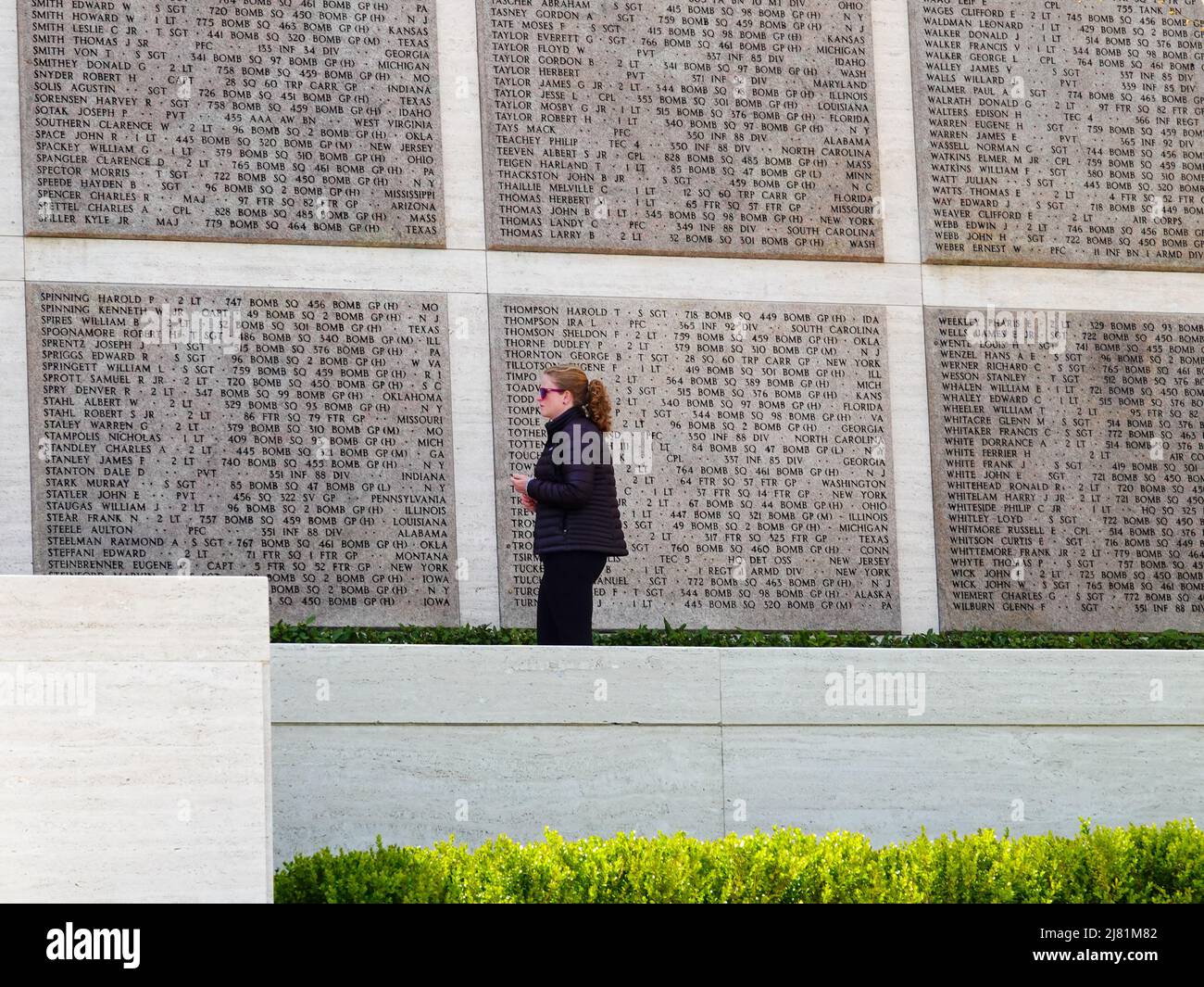 Young woman passes the 1409 names of missing solders on the Tablets of ...