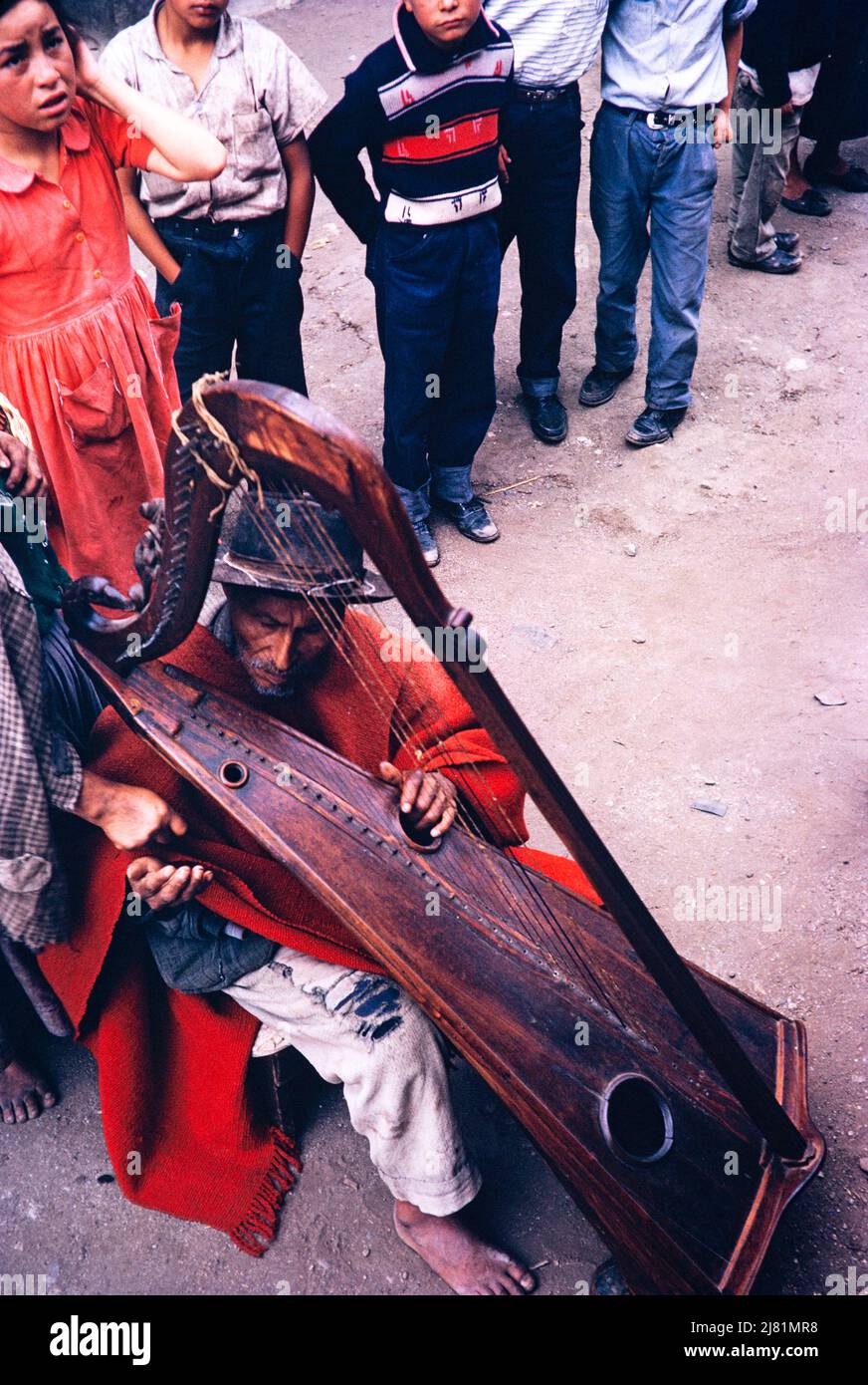 Indian playing a harp, Ecuador, South America, 1962 Stock Photo - Alamy
